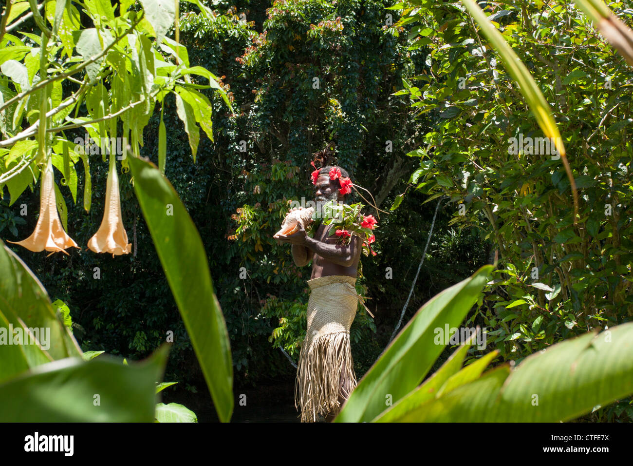 Shell blowing hi-res stock photography and images - Alamy