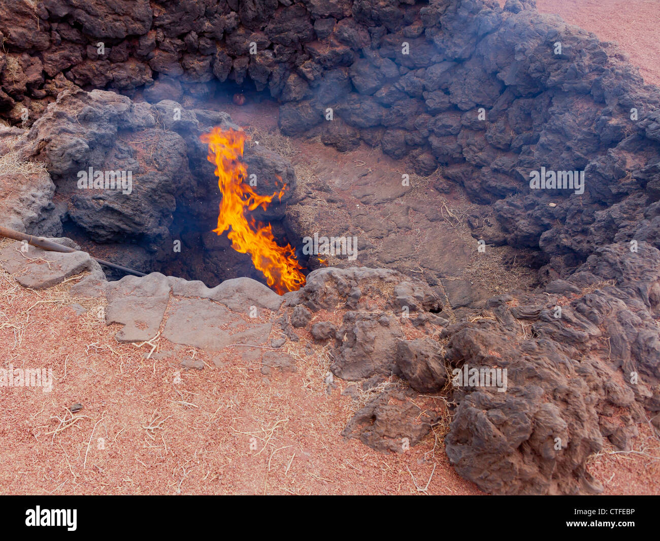 Demonstration of volcanic heat - Timanfaya national park, Lanzarote ...