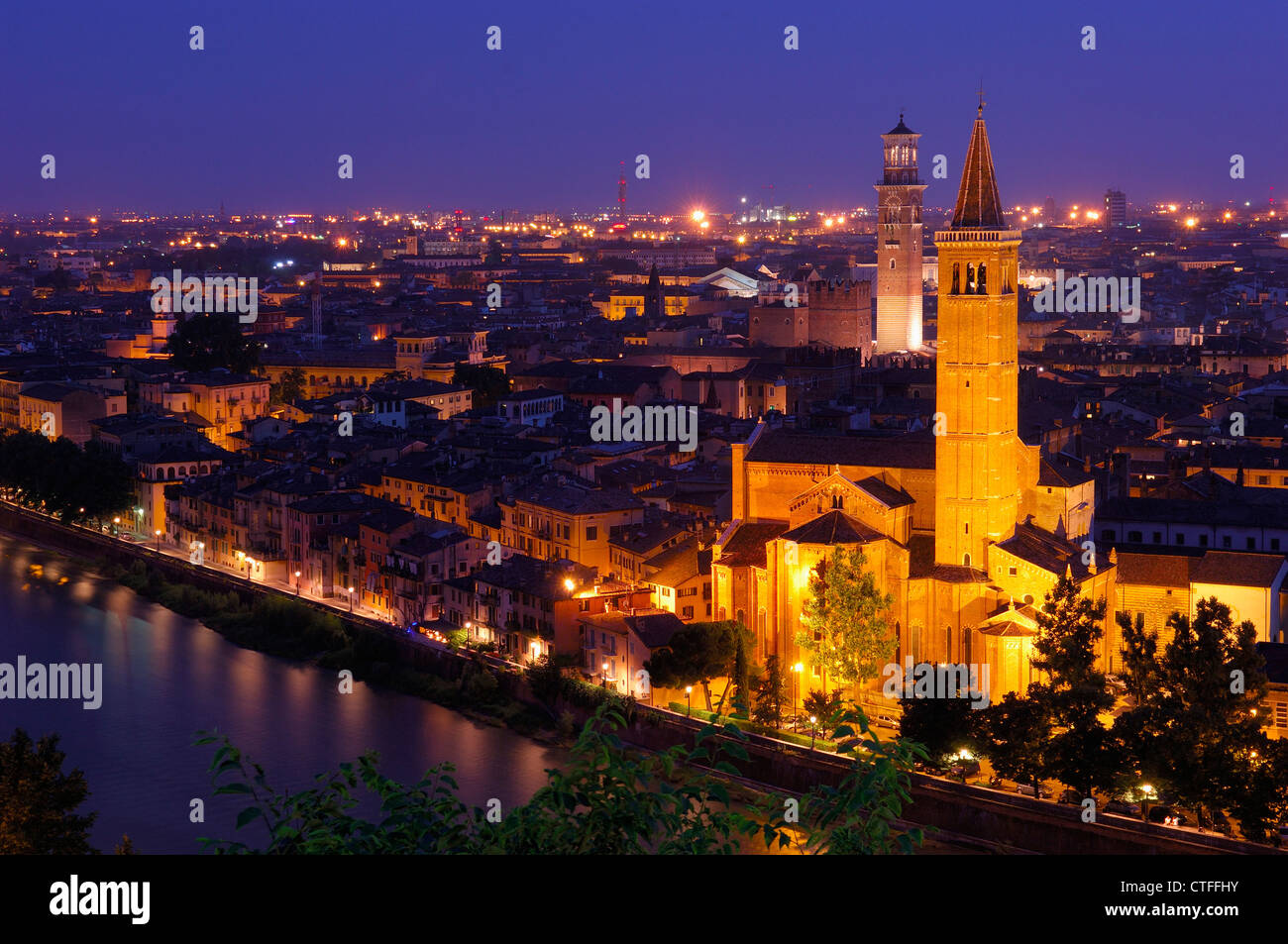Verona. Santa Anastasia church and Torre de Lamberti at Dusk. Adige ...