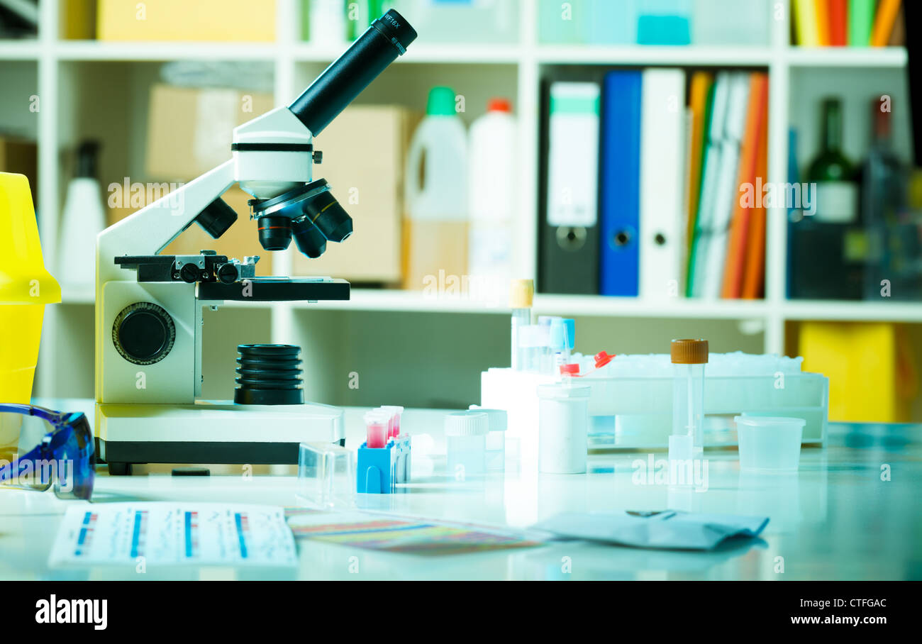 Table with a microscope preparations an biochemical laboratory Stock ...