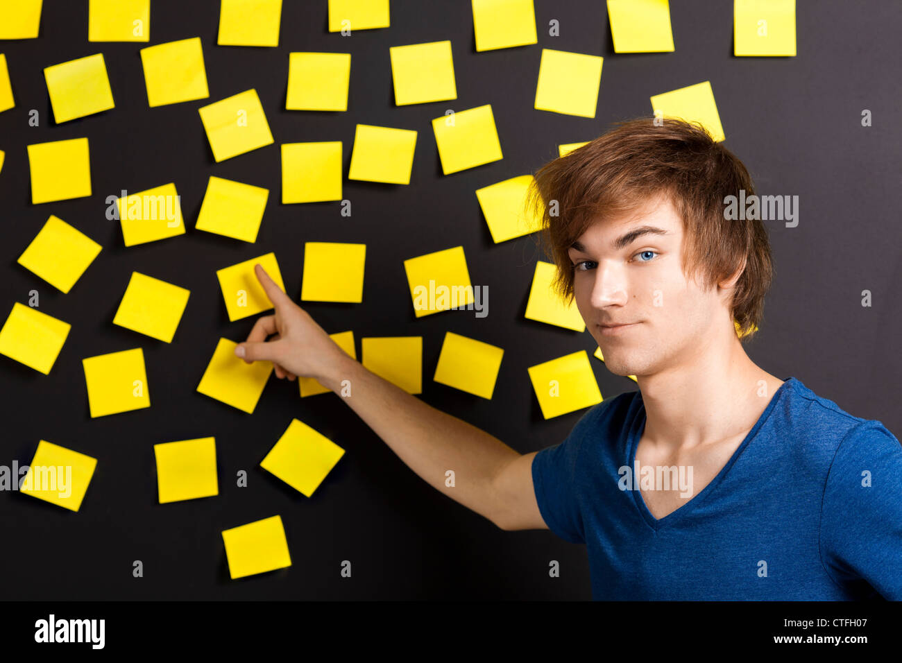 Student pointing to board youth hi-res stock photography and images - Alamy