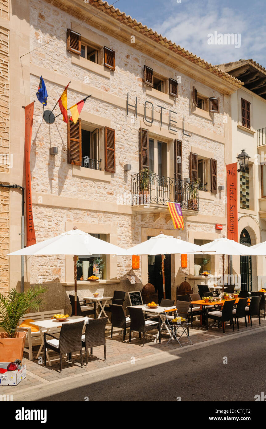 Outdoor dining tables at a restaurant in Santiyani, Mallorca/Majorca ...