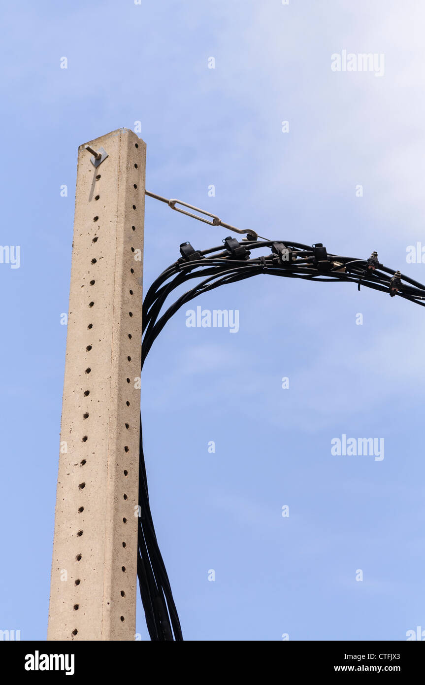 Typical Spanish concrete electricity supply pole Stock Photo - Alamy