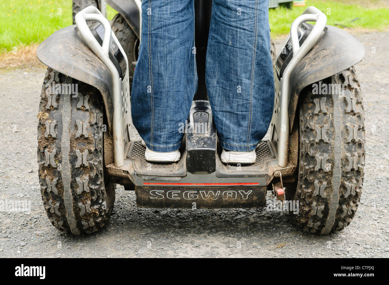 Person standing on a Segway personal transportation Stock Photo - Alamy