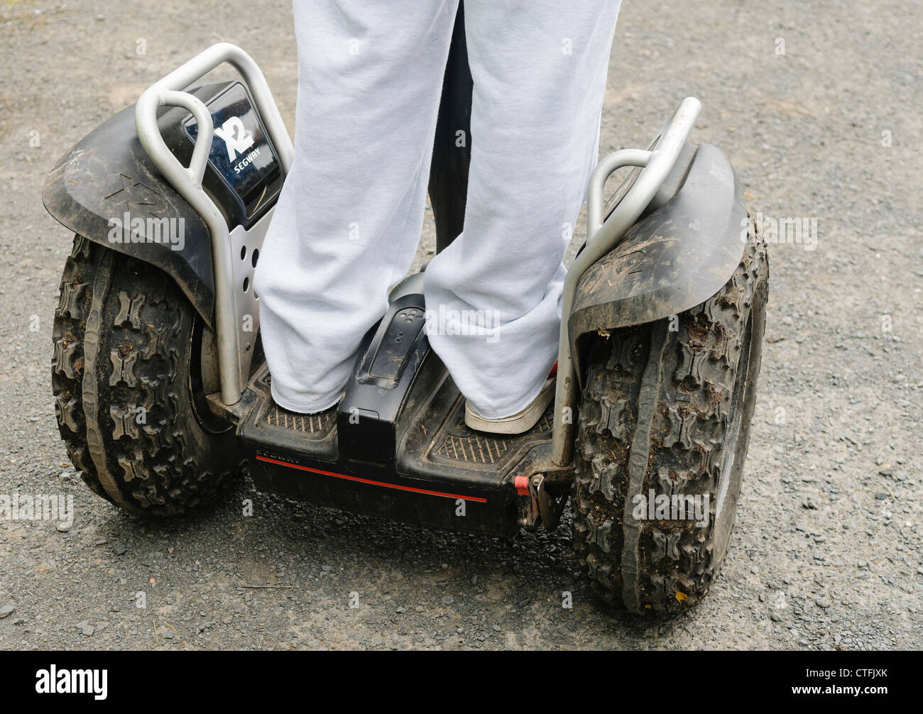Person standing on a Segway personal transportation Stock Photo - Alamy