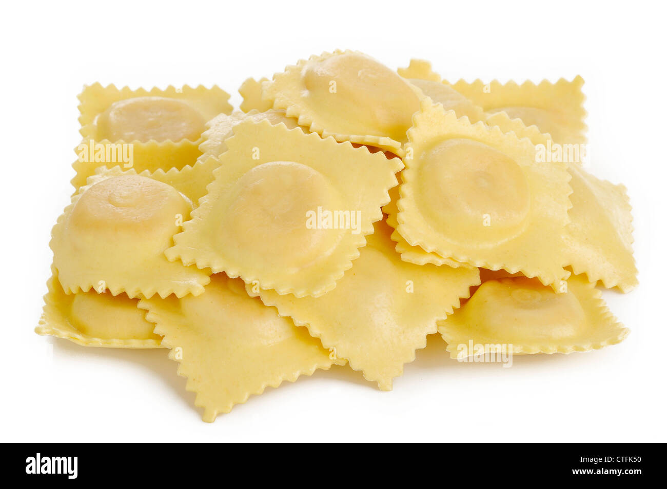 Dry ravioli pasta on white background Stock Photo - Alamy