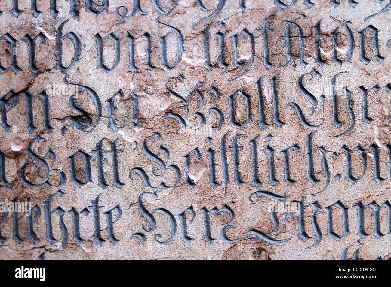 Script in stone Stock Photo - Alamy