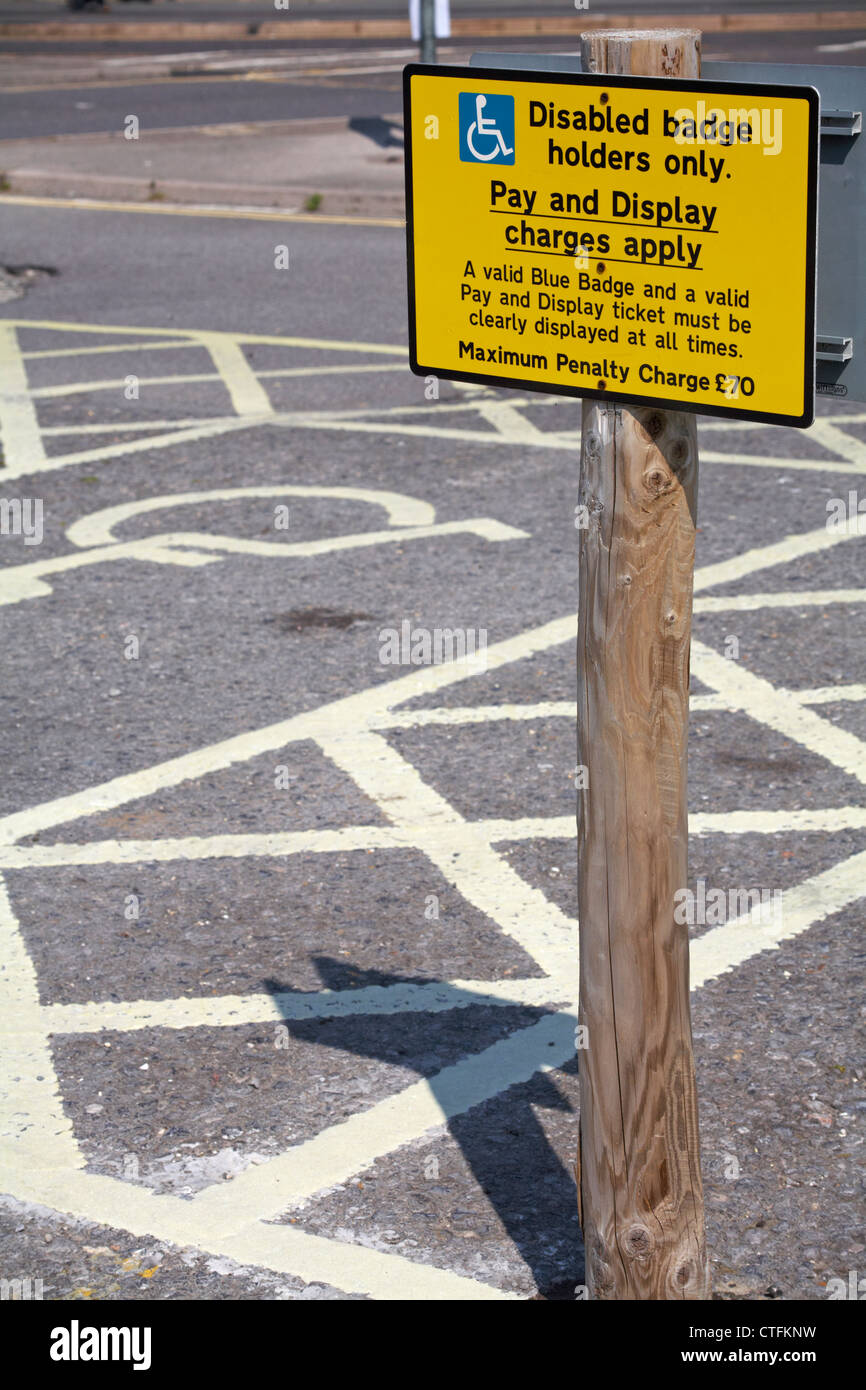 disabled car parking bay with blue badge parking details notice at ...