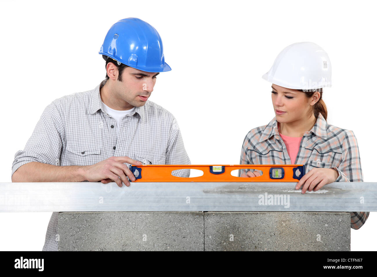 Female builder using spirit hi-res stock photography and images - Alamy
