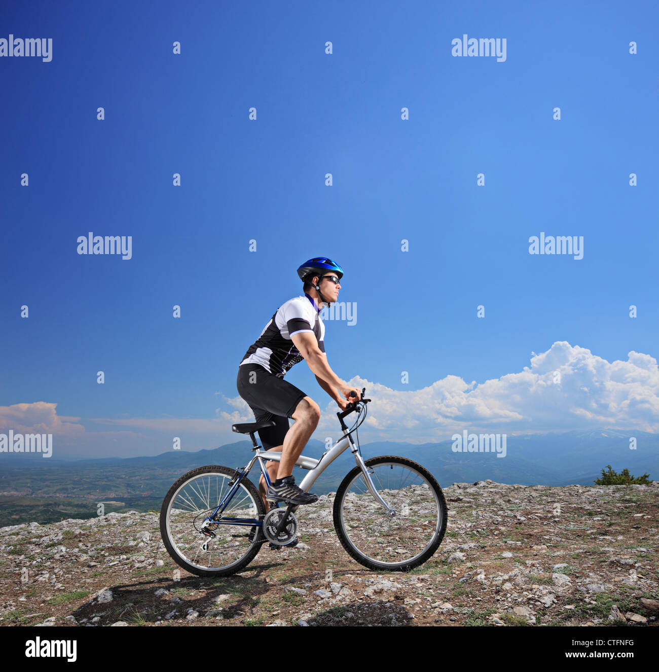 Male cyclist riding on mountain hi-res stock photography and images - Alamy