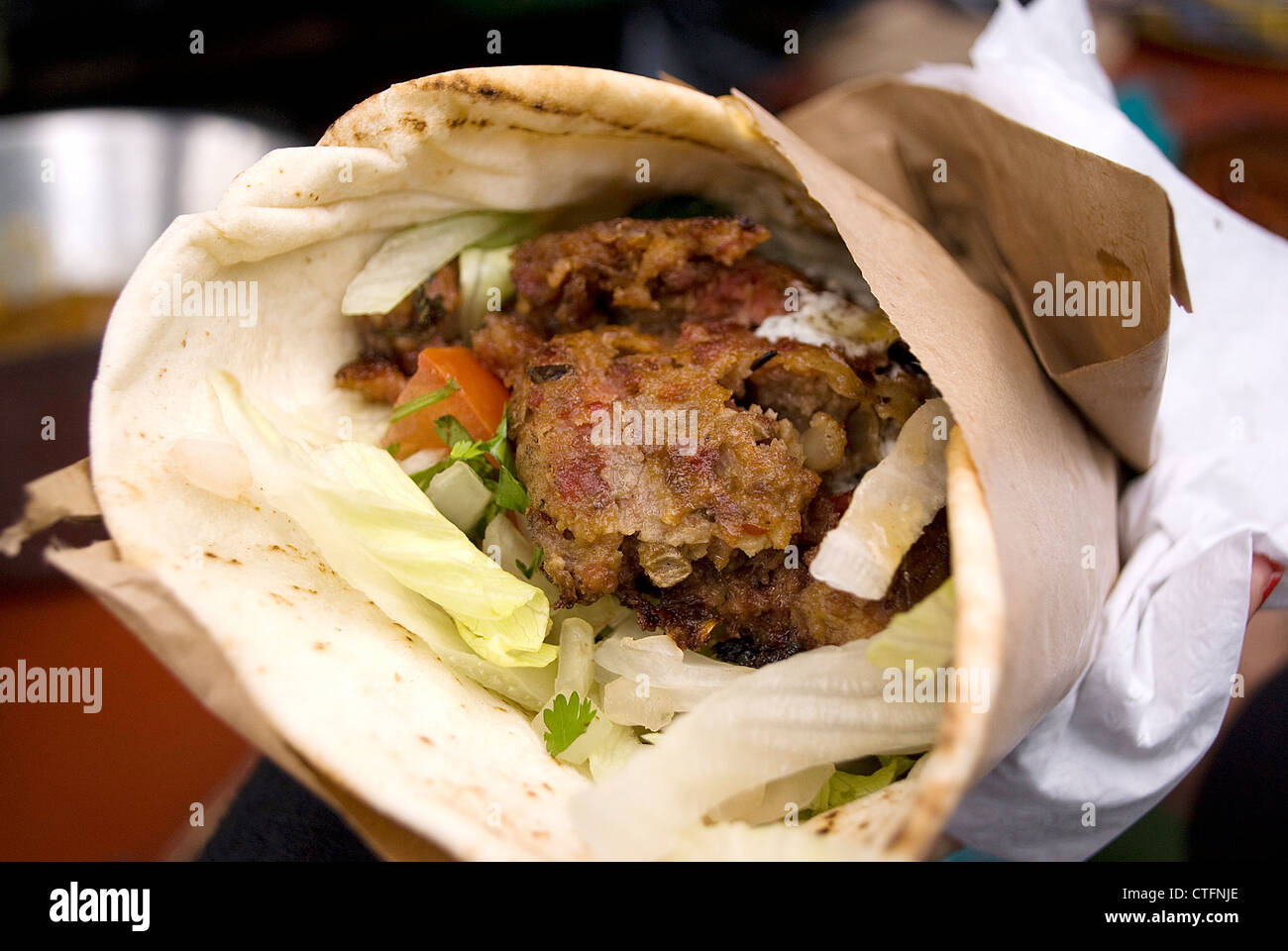 beef wrap with fresh vegetables on a market Stock Photo - Alamy