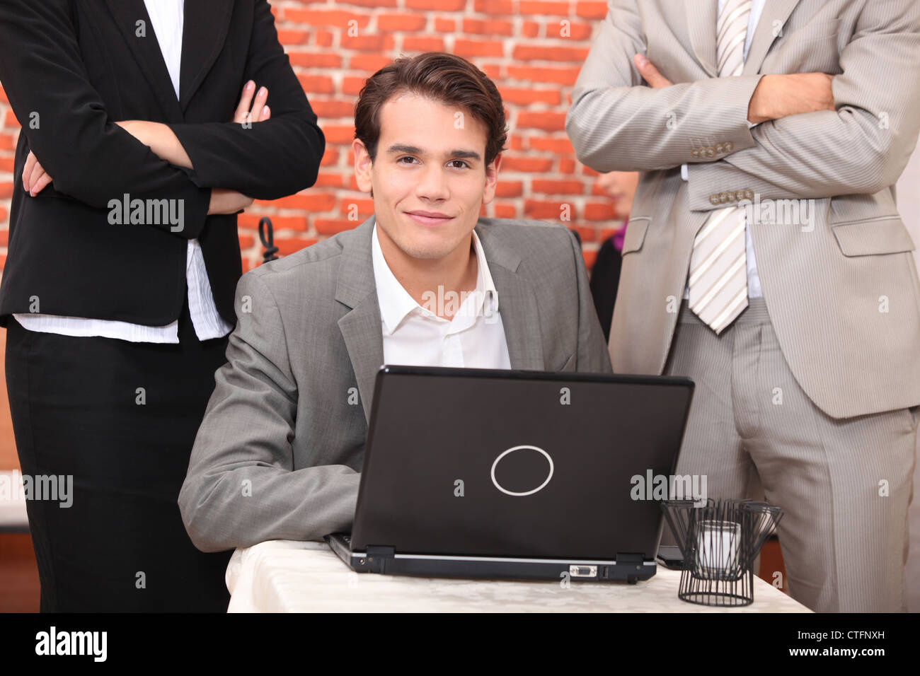 Smart young man at a laptop computer Stock Photo - Alamy