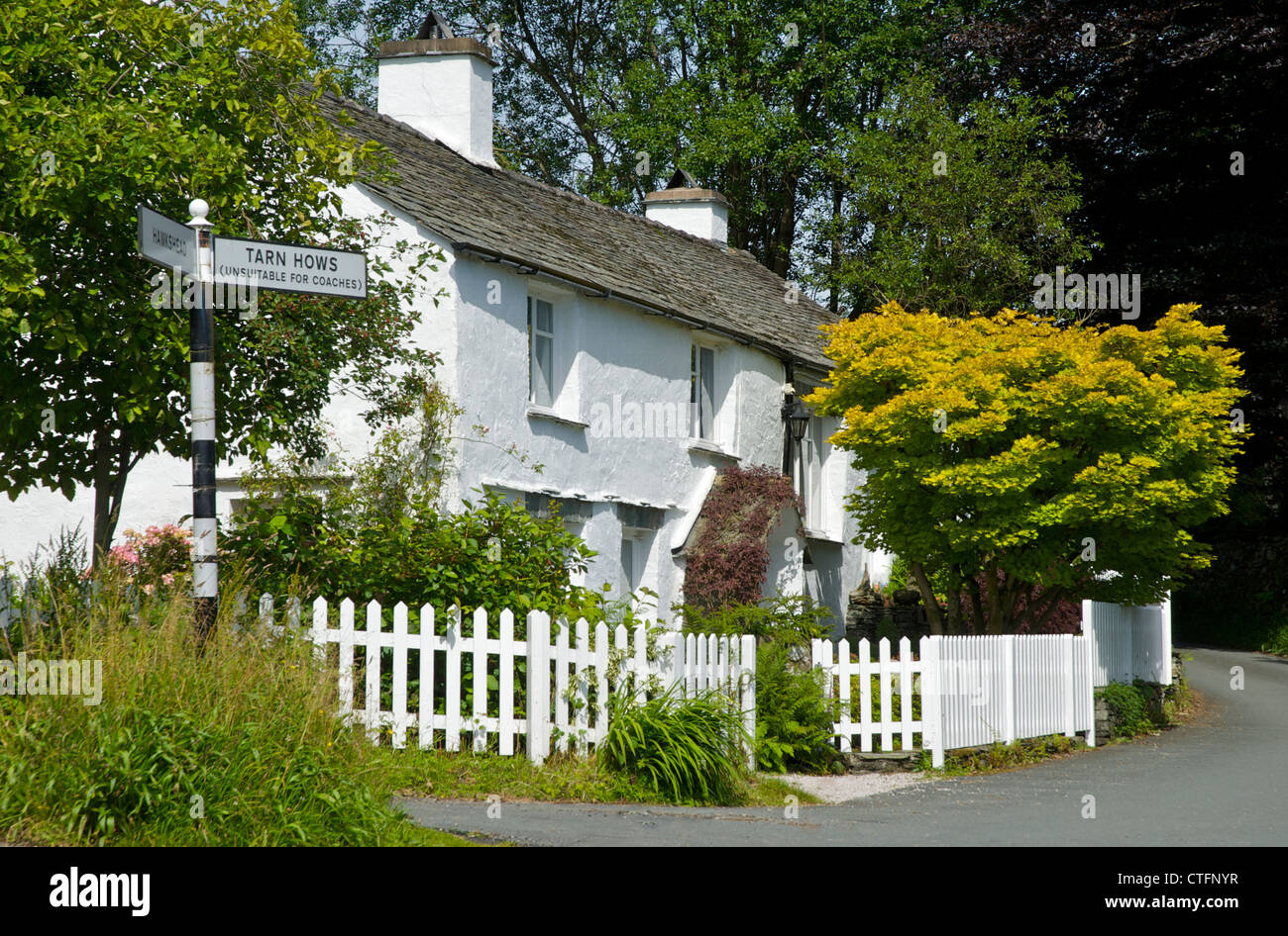 Whitewashed cottage near the village of Hawkshead, Lake District ...