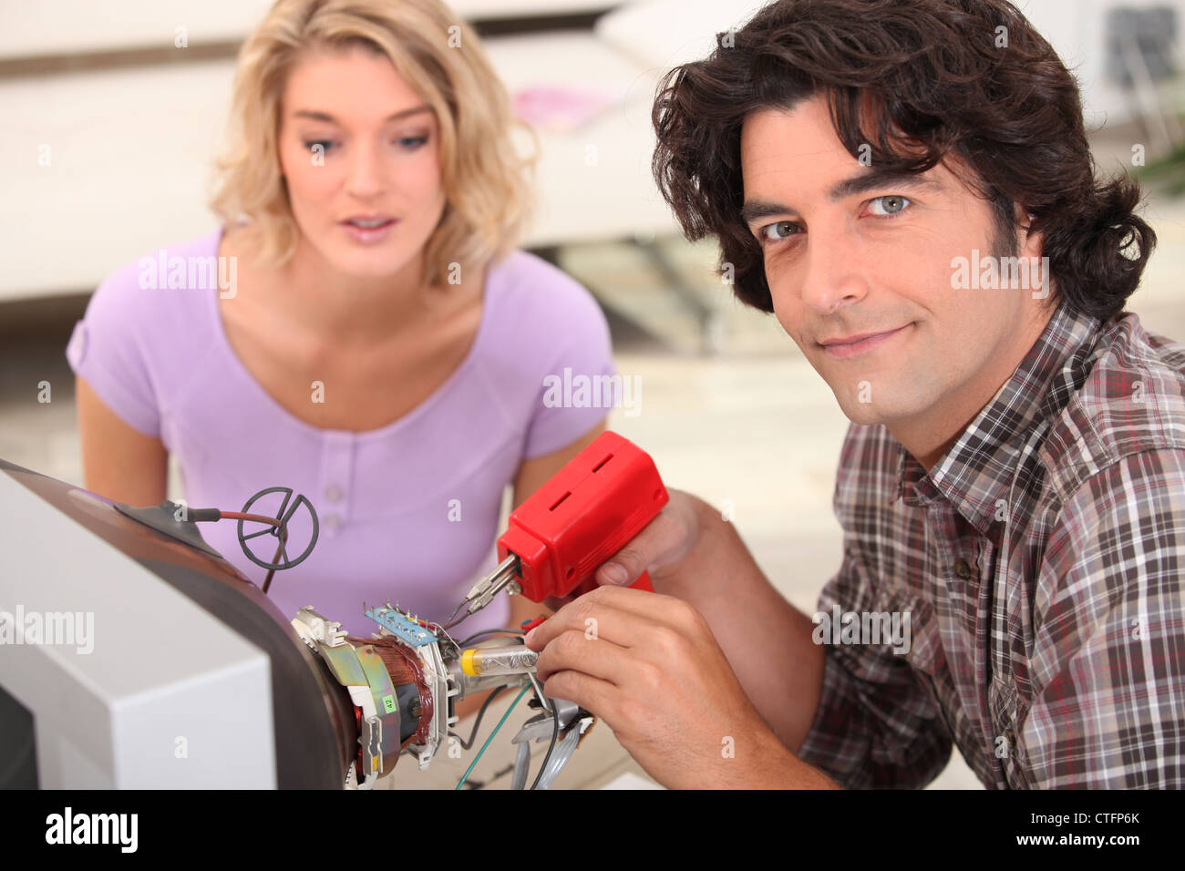 Handyman and client hi-res stock photography and images - Alamy
