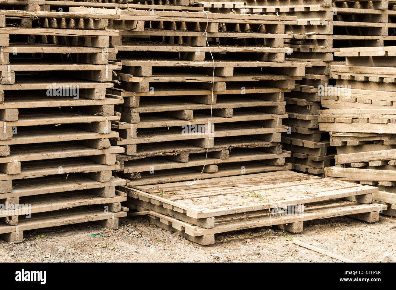 A stack of wooden pallets ready to be used to transport goods Stock ...