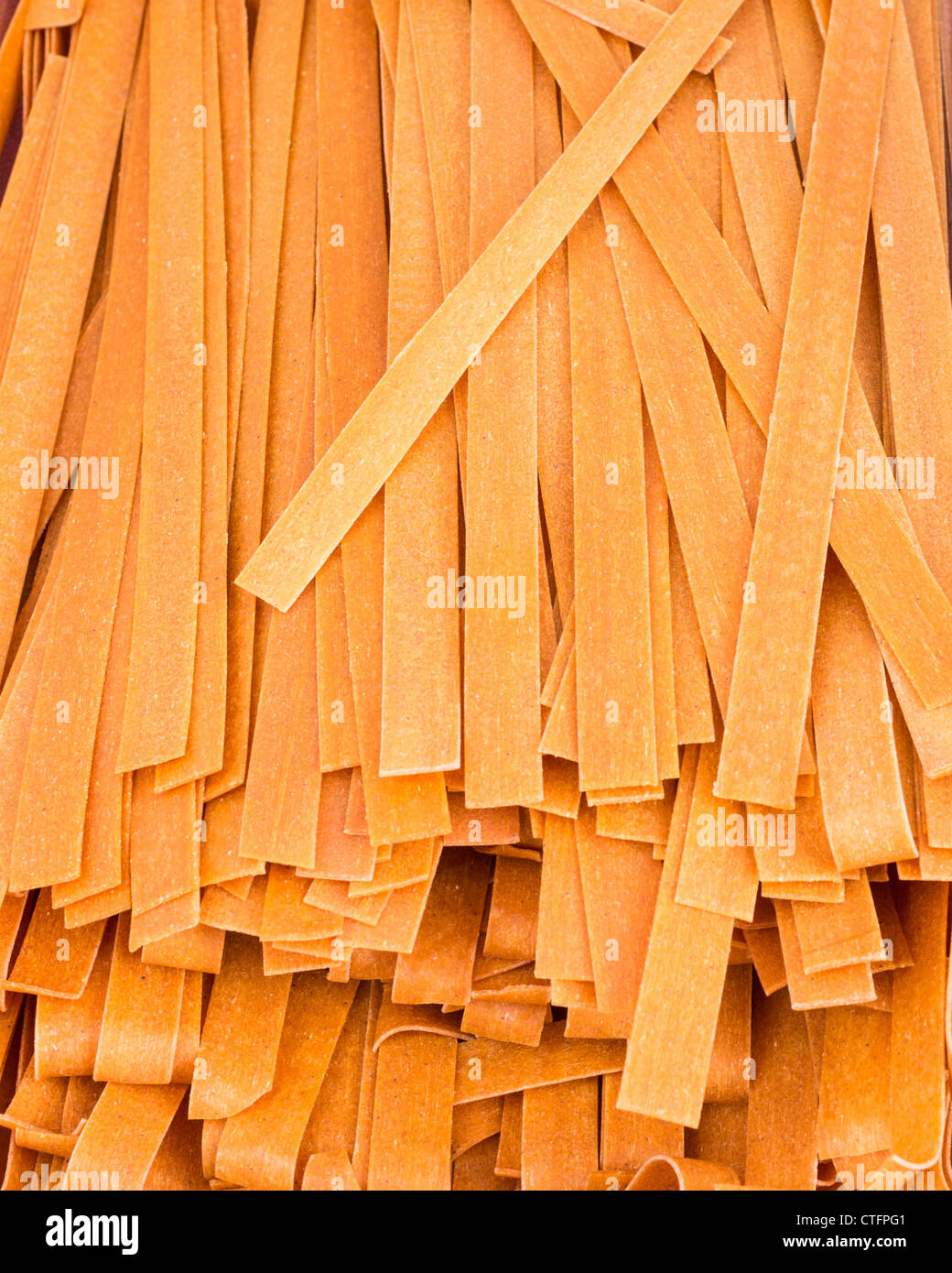 Freshly made pasta drying and ready for use Stock Photo - Alamy