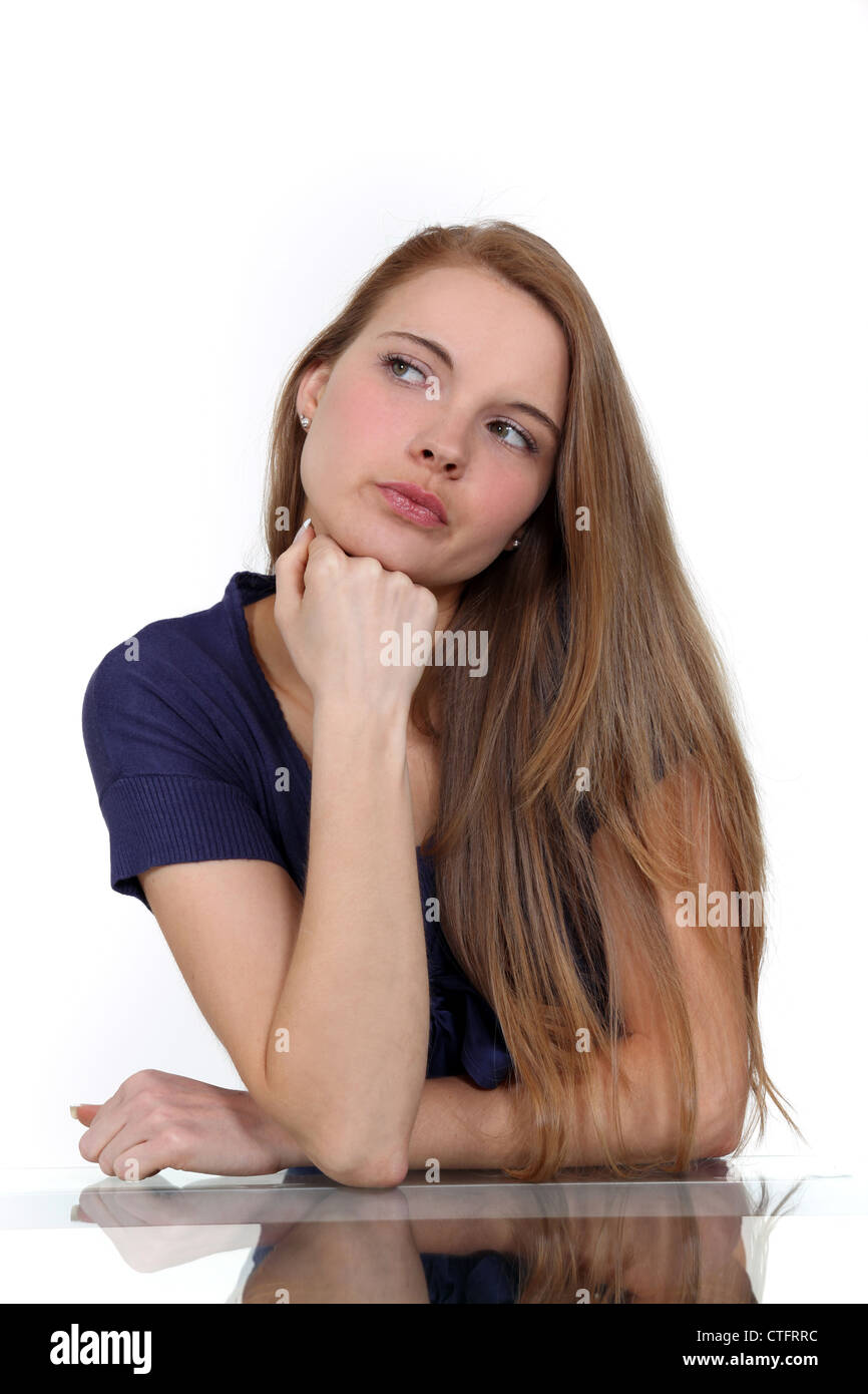 Woman having a dilemma Stock Photo - Alamy