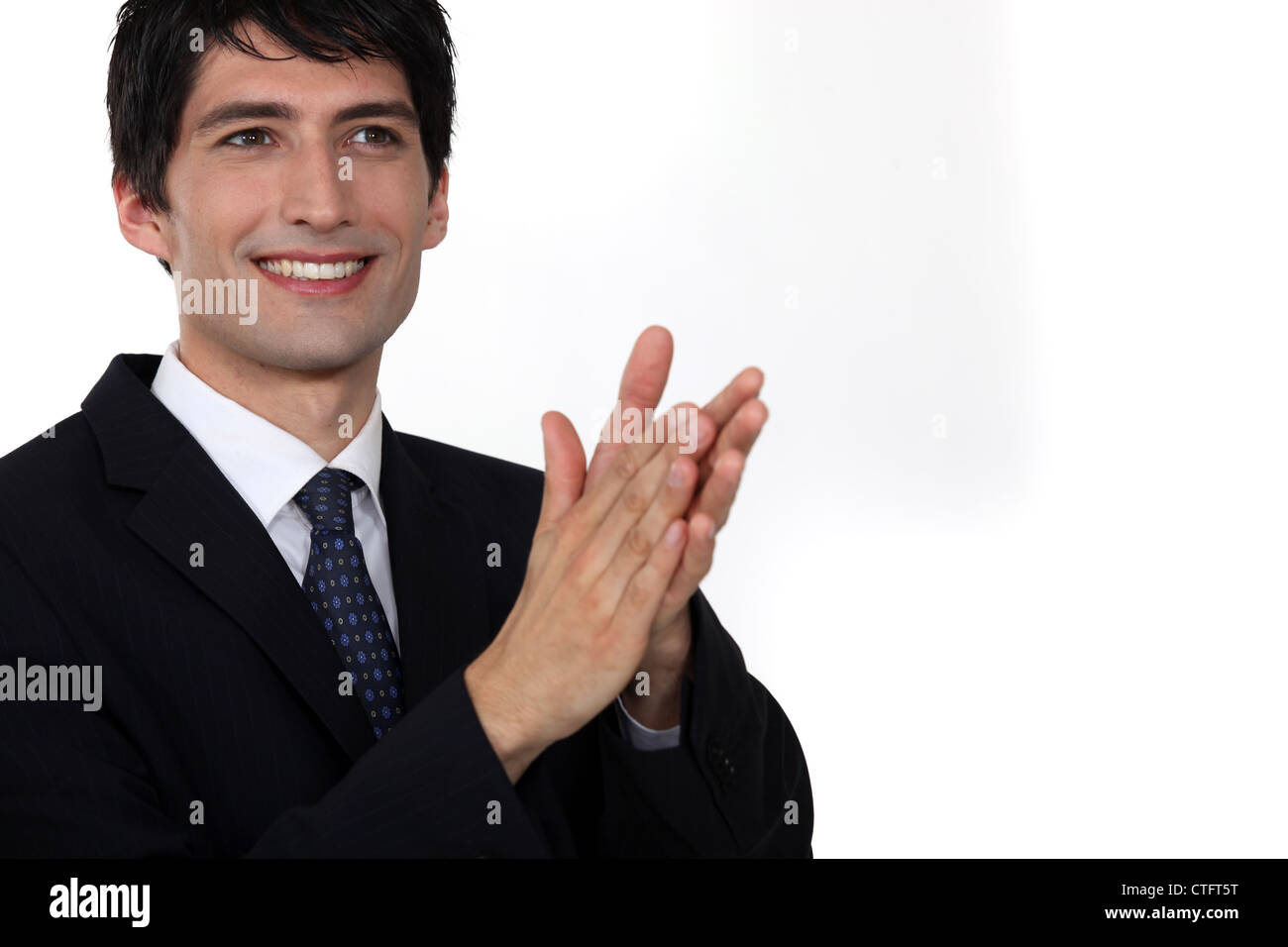 A businessman clapping hands Stock Photo - Alamy