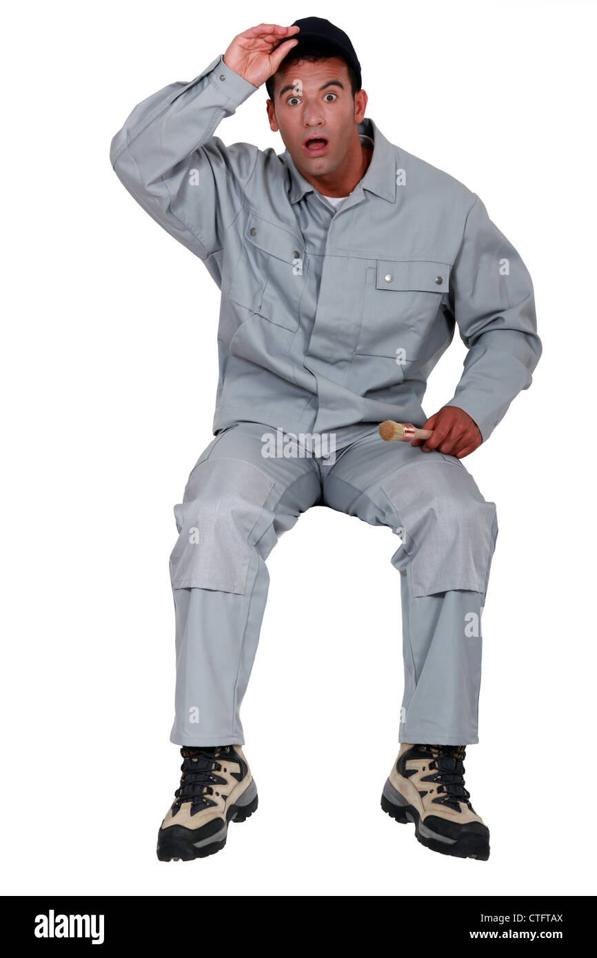 Shocked laborer, studio shot Stock Photo - Alamy