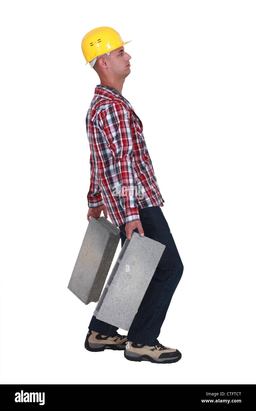 Lifting heavy blocks hi-res stock photography and images - Alamy