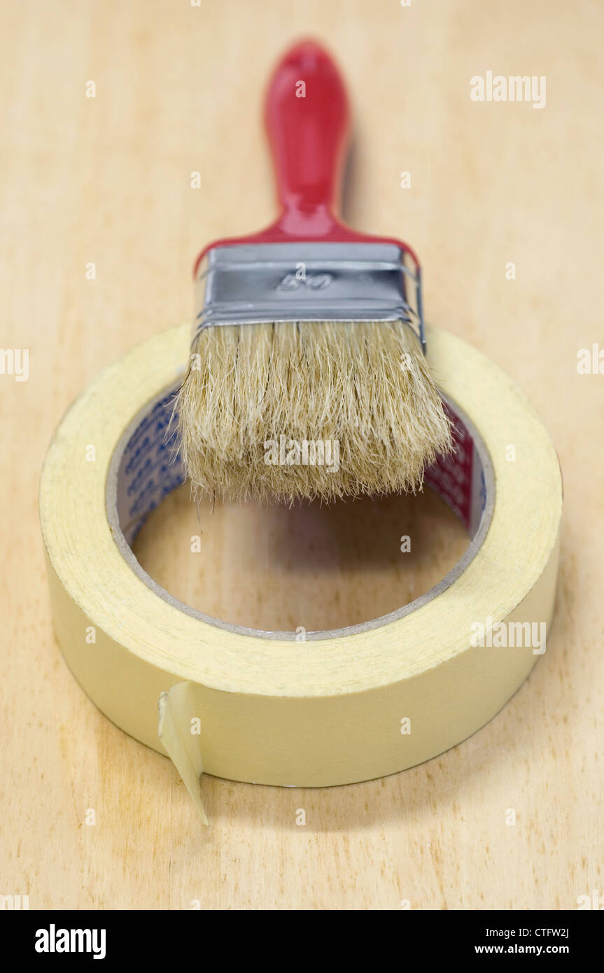 paint brush and masking tape Stock Photo - Alamy