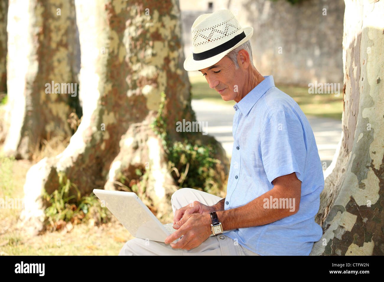 Man with computer Stock Photo - Alamy