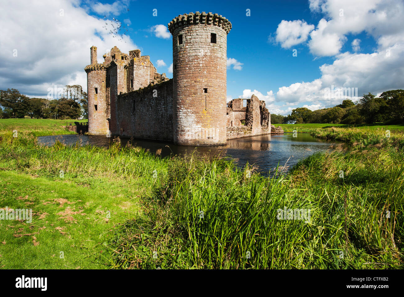 View of Caerlaverock Castle. It is a triangular, moated castle first ...