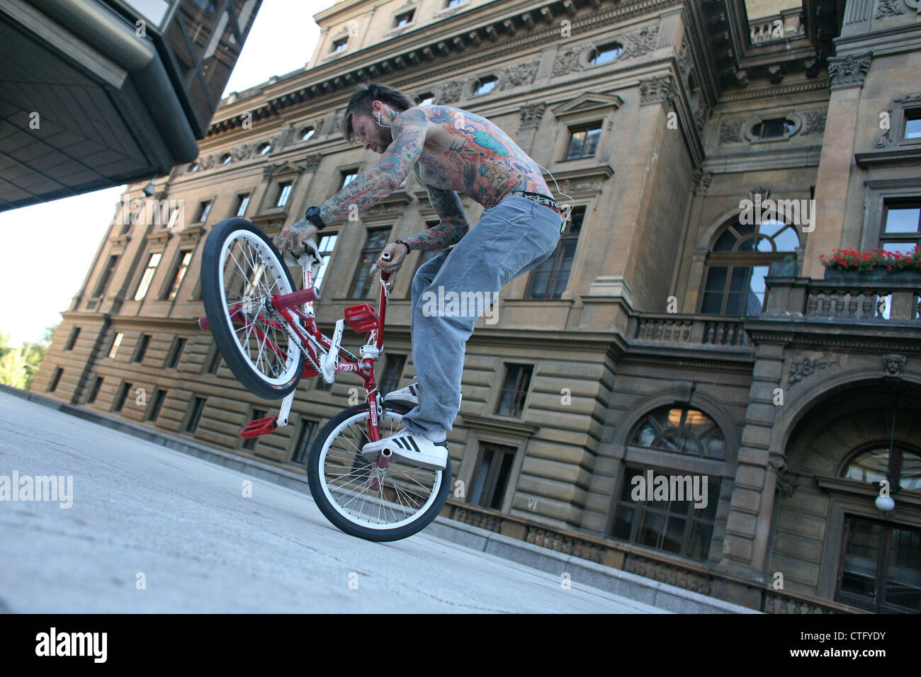 BMX rider Dominik Nekolny trains in front of the National Theatre in ...