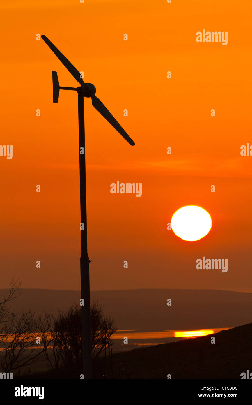 Wind turbine with sunset Stock Photo - Alamy