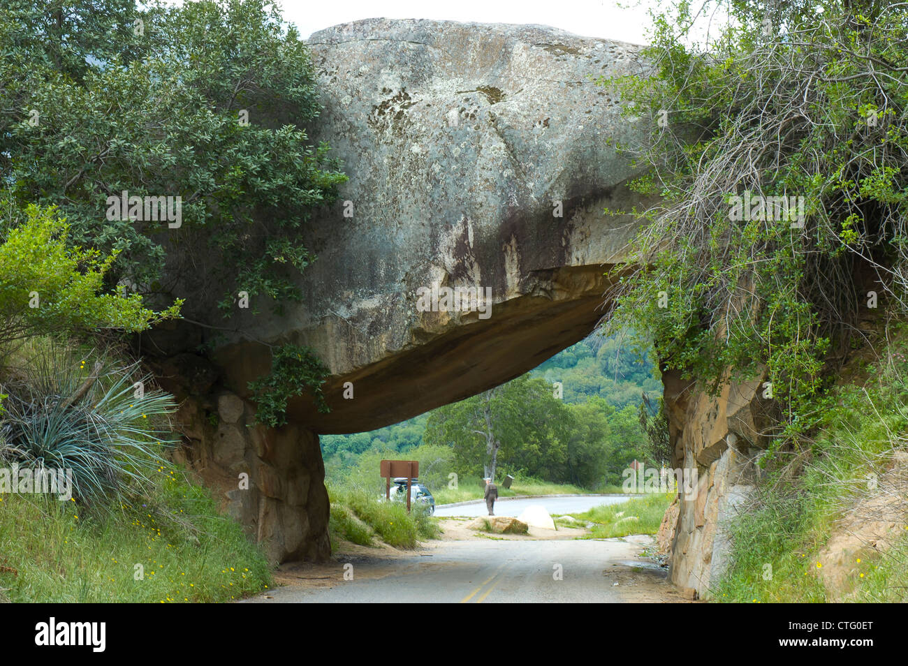 Natural rock bridge on a road in California, USA Stock Photo - Alamy