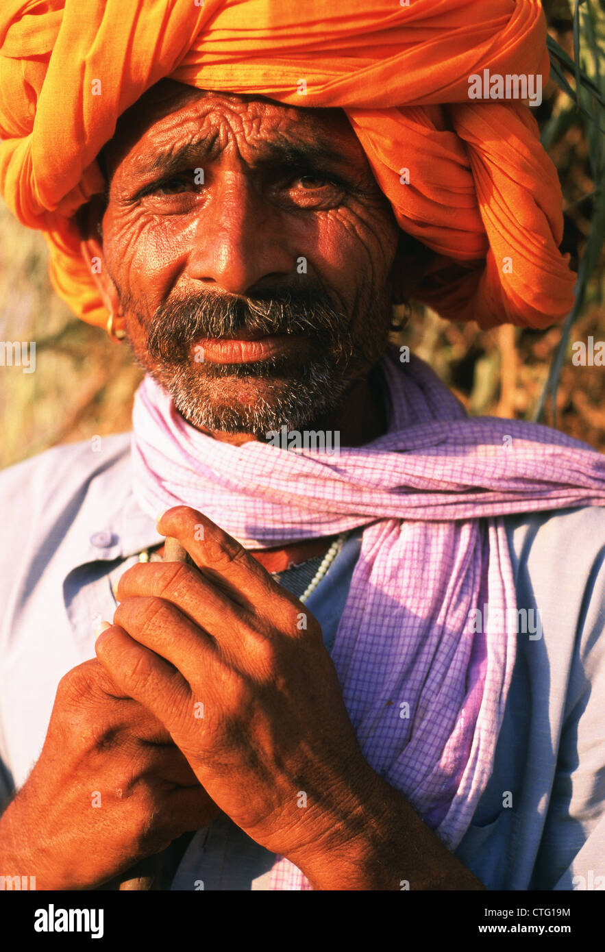 Tribal man feeling frightened ( India Stock Photo - Alamy