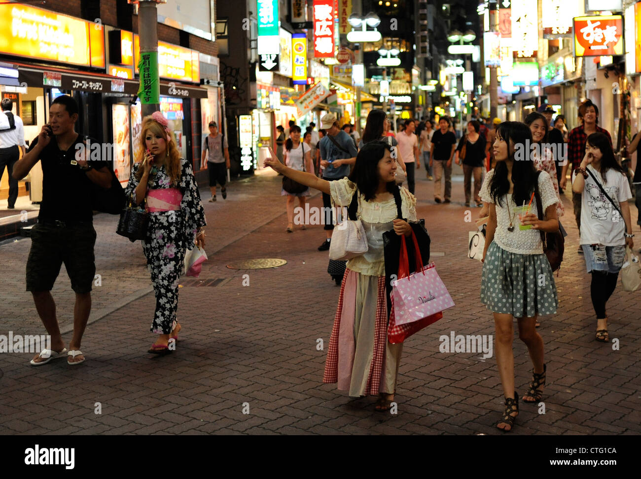 People walk along a street in central Tokyo in Japan Stock Photo - Alamy