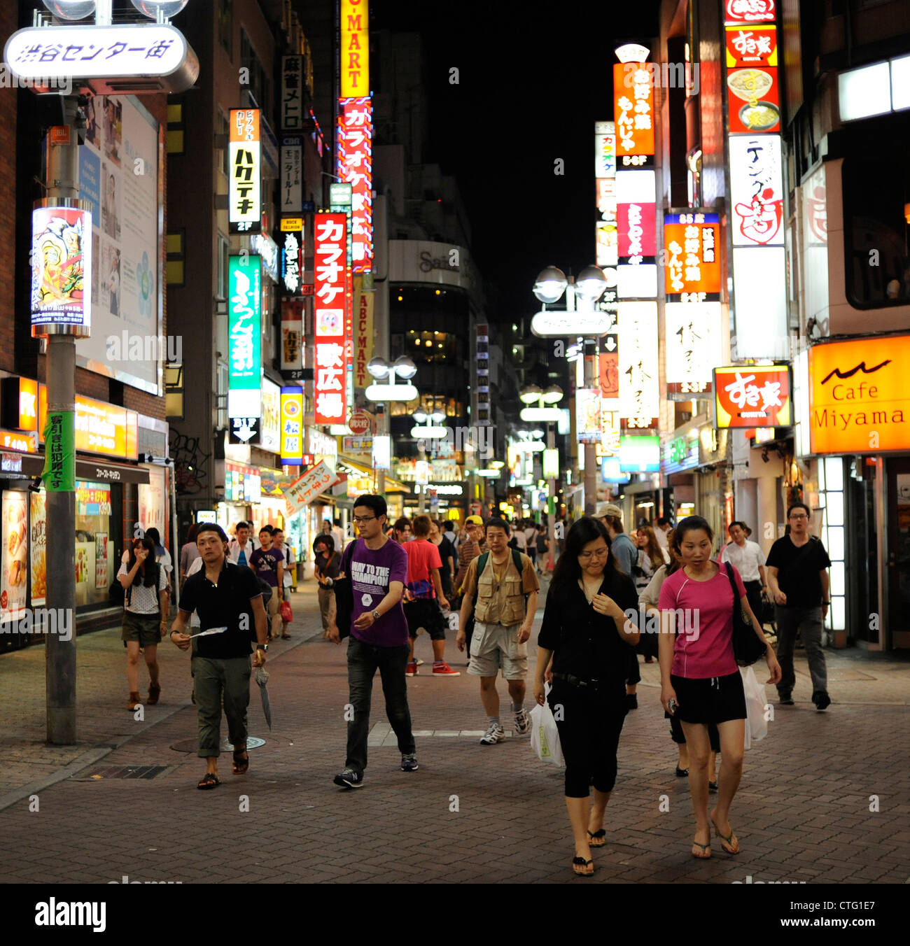 People walk along a street in central Tokyo in Japan Stock Photo - Alamy