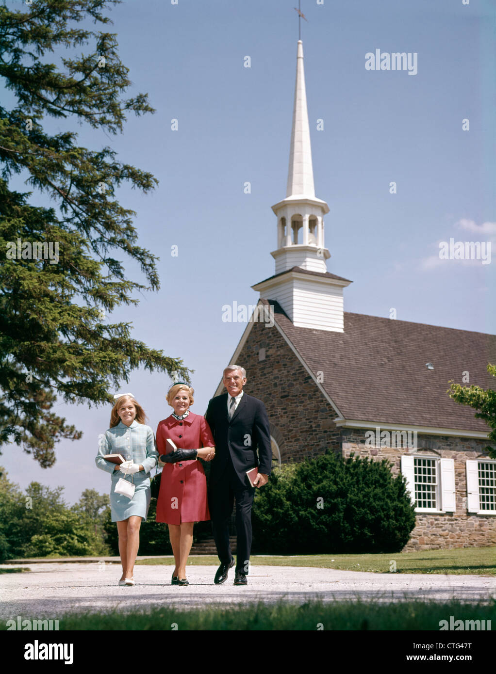1960s SMILING FAMILY LEAVING CHURCH EACH CARRYING BIBLE Stock Photo - Alamy