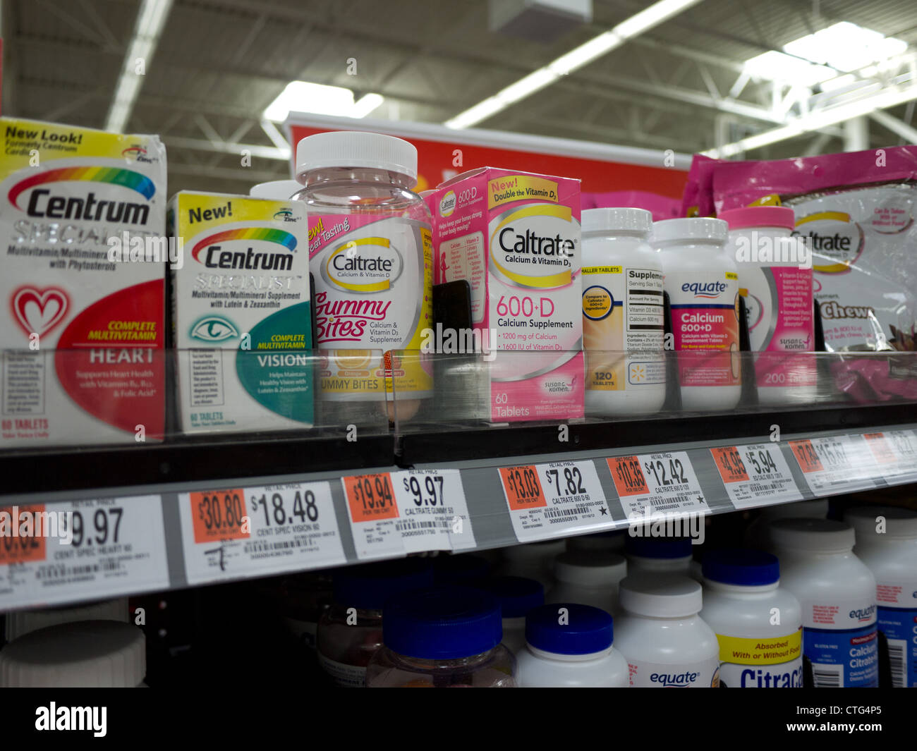 pharmacy shelves products centrum caltrate Stock Photo - Alamy
