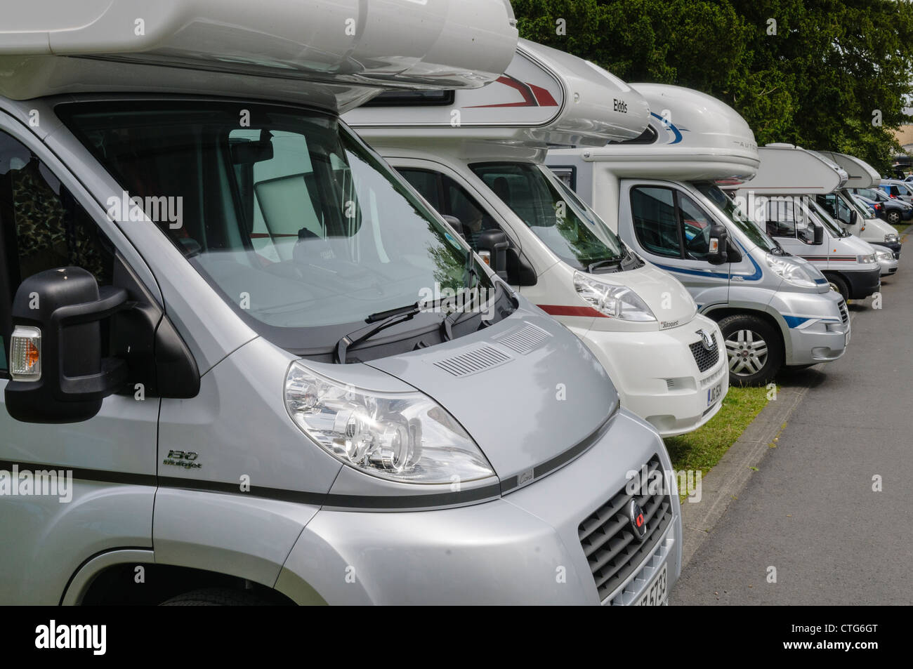 Row of motorhome campervans Stock Photo - Alamy