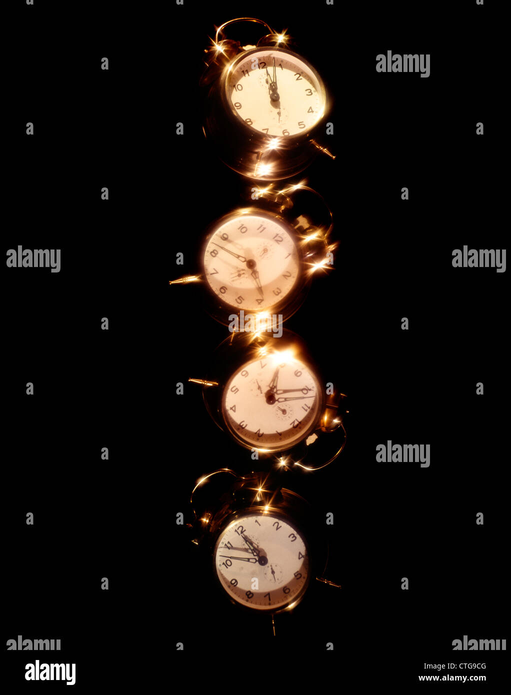 FALLING ALARM CLOCKS Stock Photo - Alamy