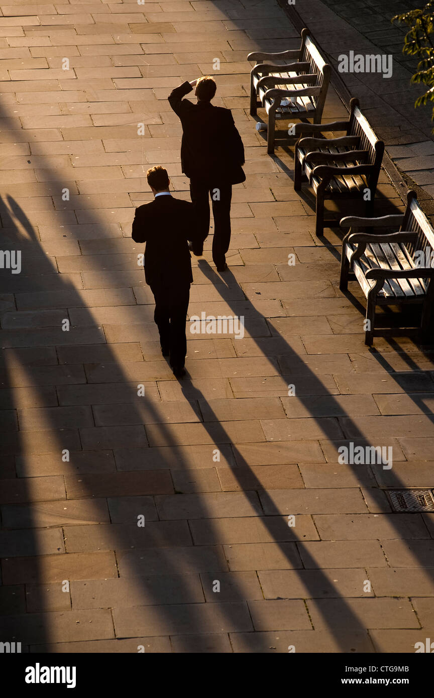 Man walking shadow london hi-res stock photography and images - Alamy