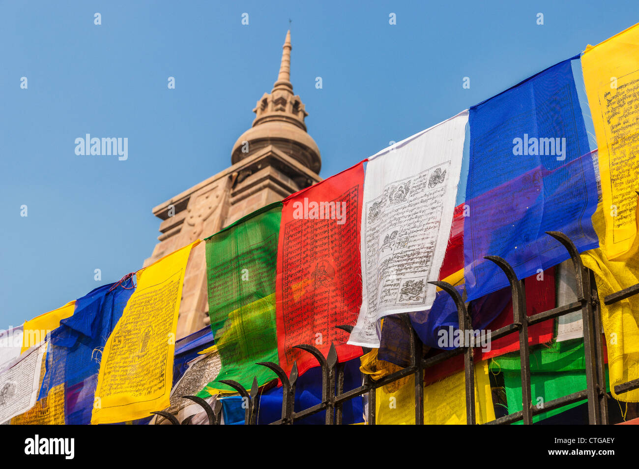 Prayer flags hanging in front of a temple, Varanasi, India Stock Photo ...