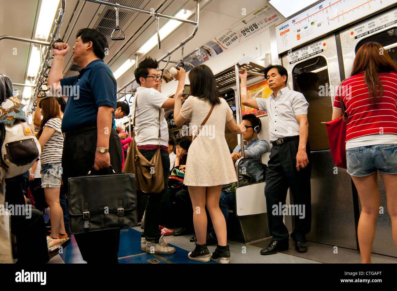 Passengers on subway train, Seoul, Korea Stock Photo - Alamy