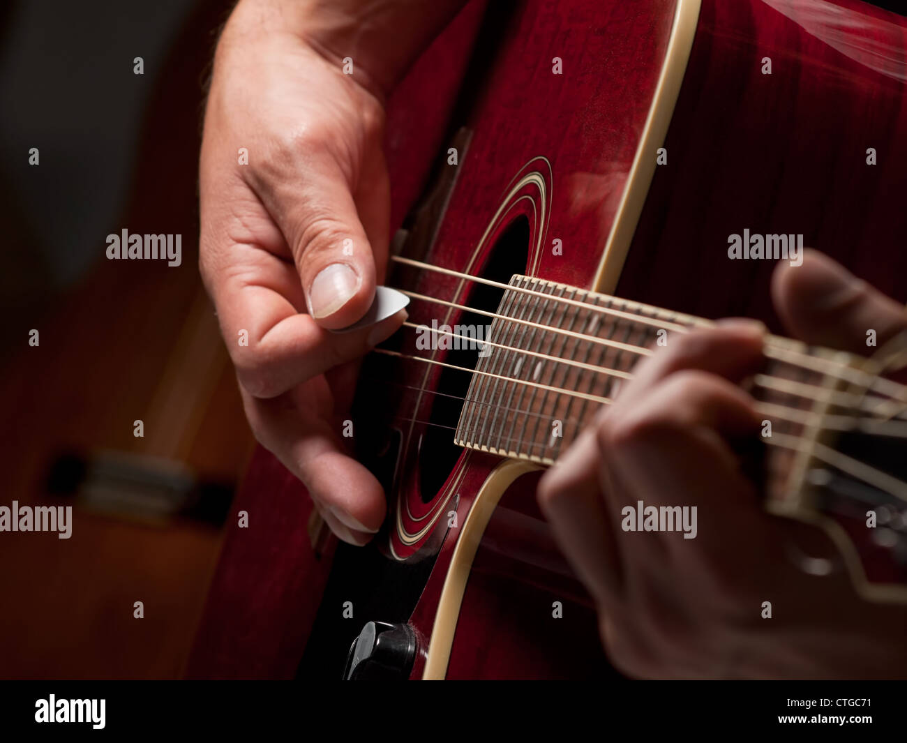 Man playing acoustic guitar,closeup, for entertainment, music themes ...