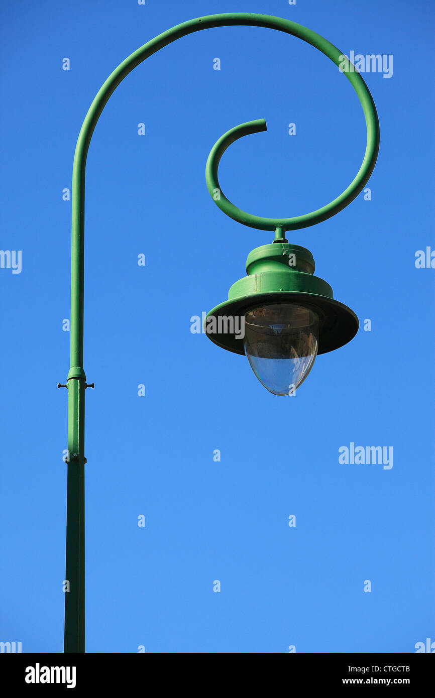 Lamp post in Brasov, Romania against a clear blue sky Stock Photo - Alamy