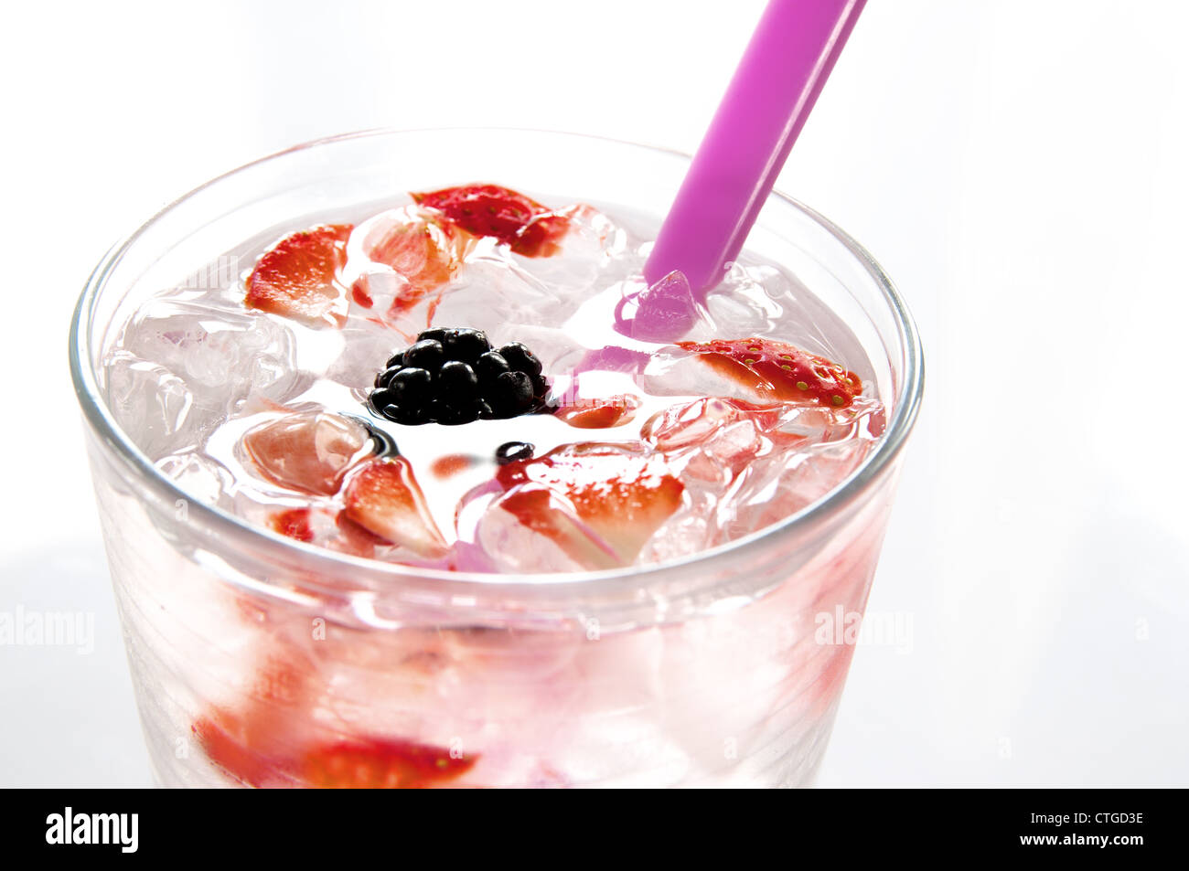 Summer fruit drink in a glass with ice and berries Stock Photo - Alamy