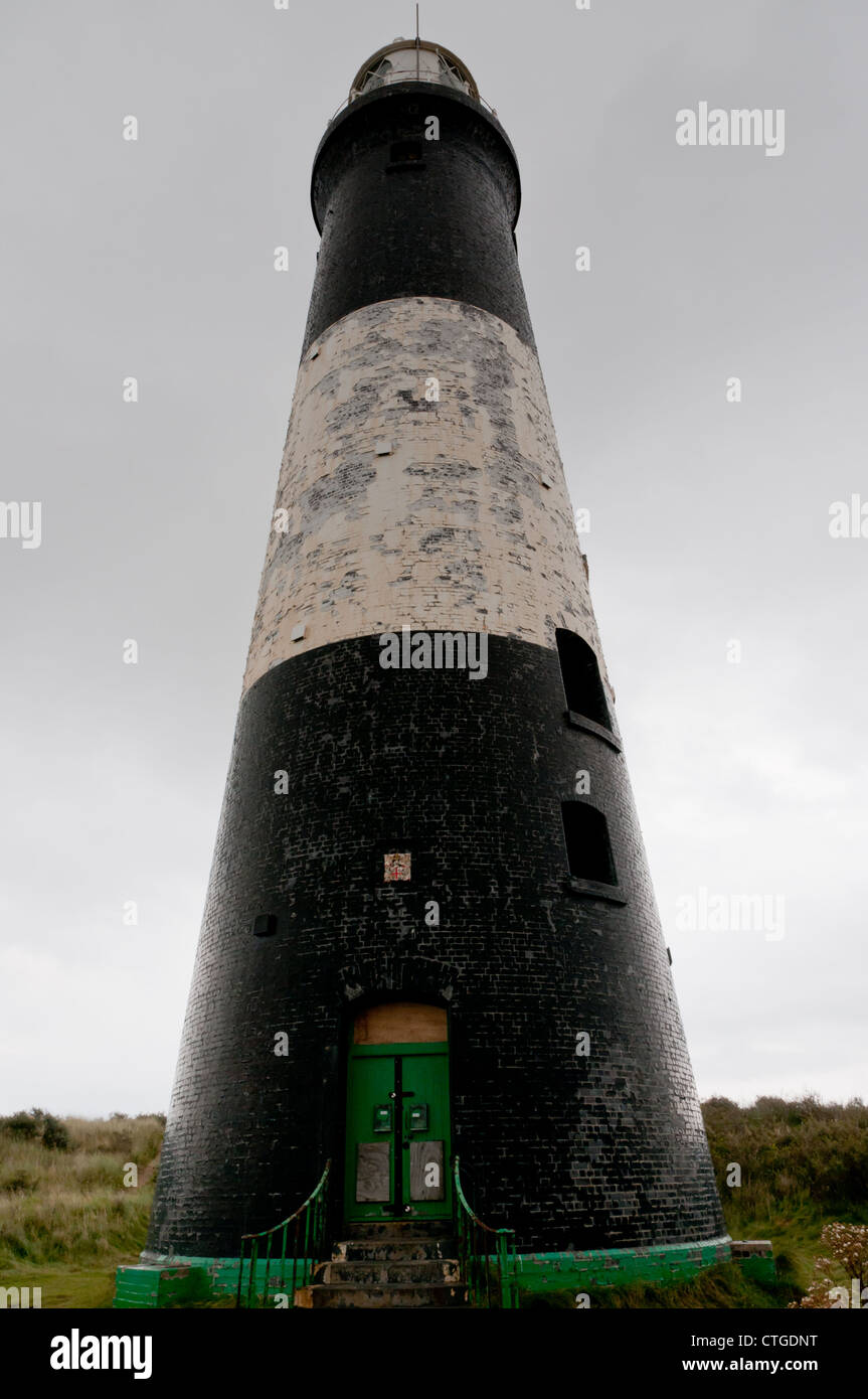 The exterior of Spurn Lighthouse against a brooding sky. Spurn Point ...