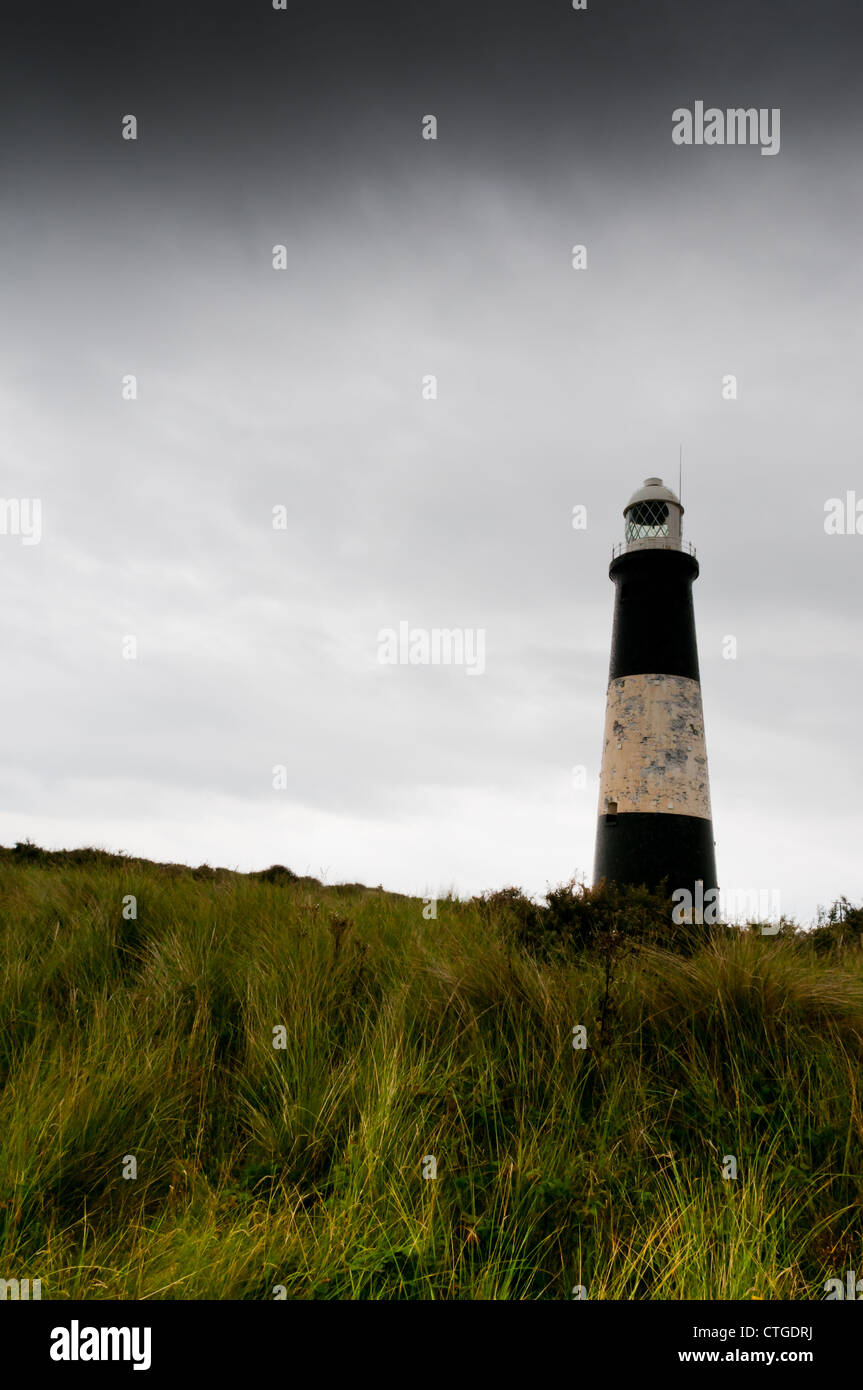 Spurn Lighthouse on a grey day. Spurn Head Spurn Point gray gloomy ...