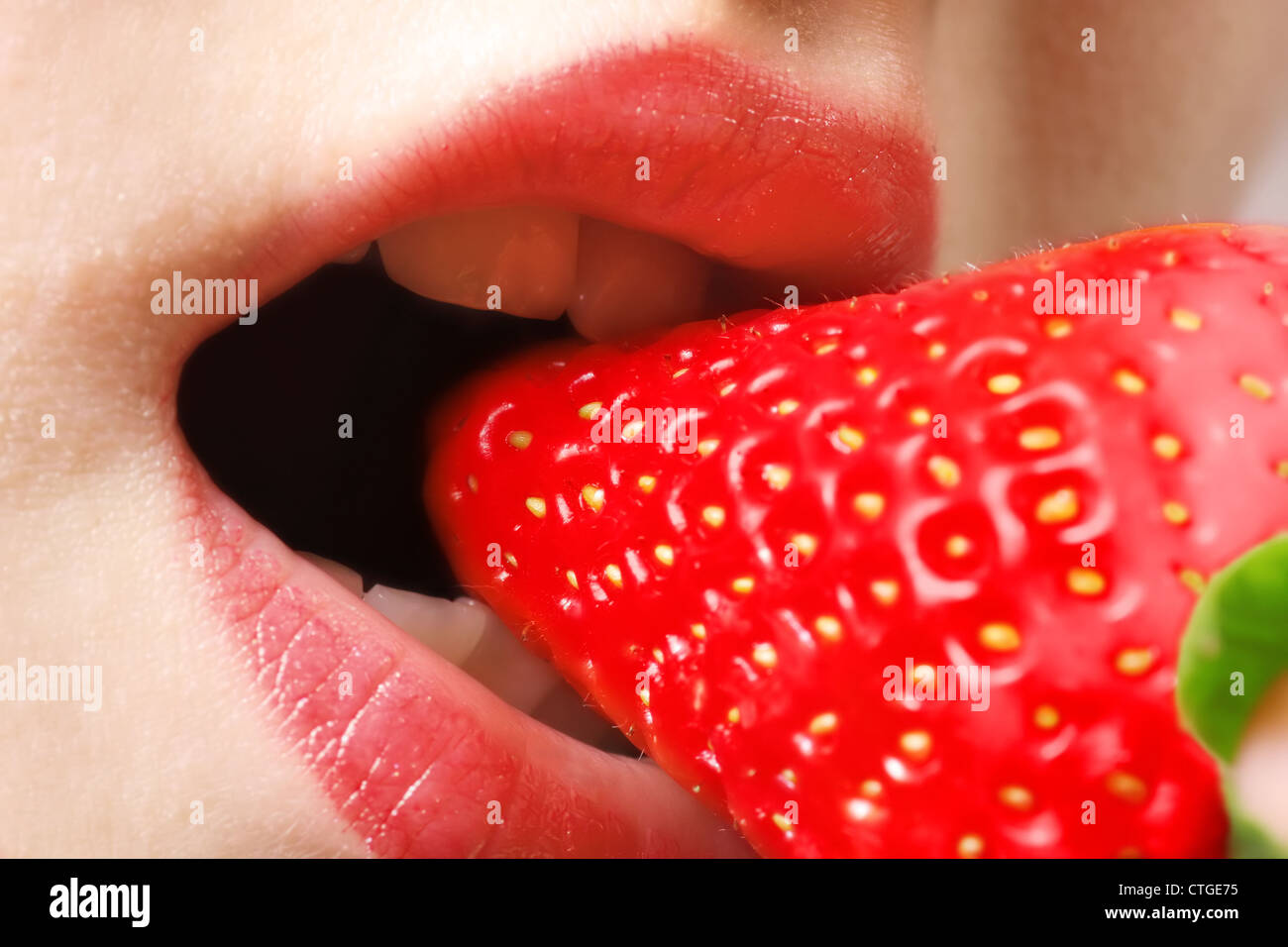 girl with strawberry Stock Photo - Alamy