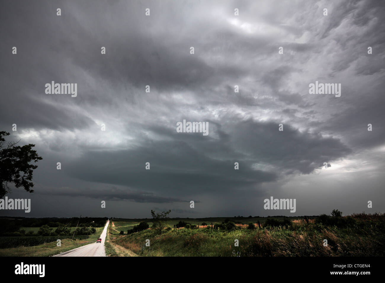 Small thunderstorm above a country road in Nebraska Stock Photo - Alamy