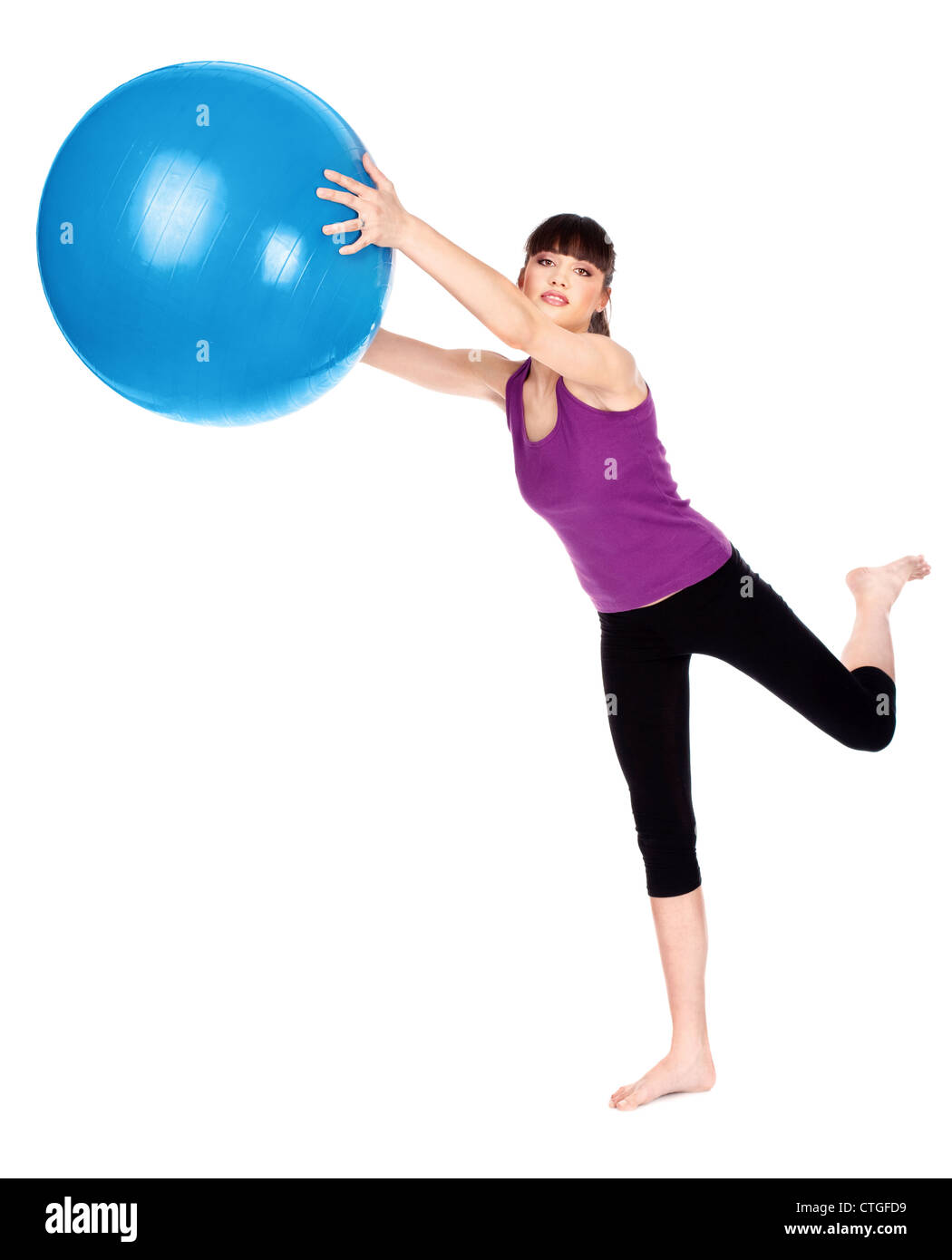 Woman doing exercise with pilates blue ball, isolated on white Stock ...