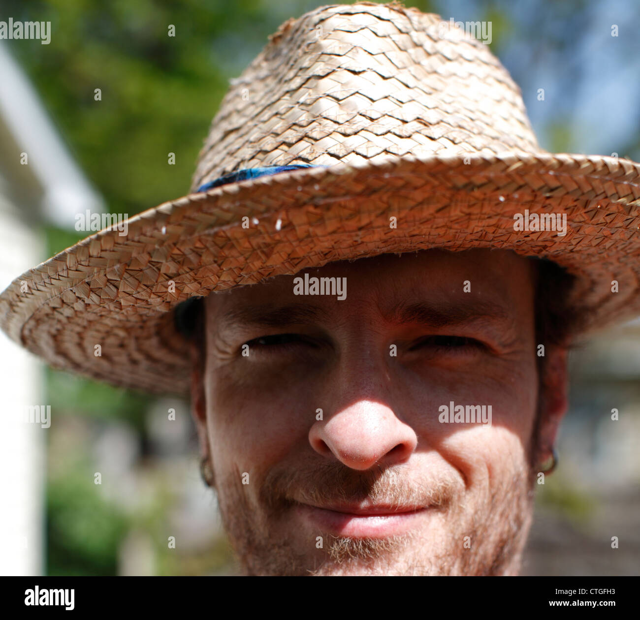 Hat to shade face hi-res stock photography and images - Alamy