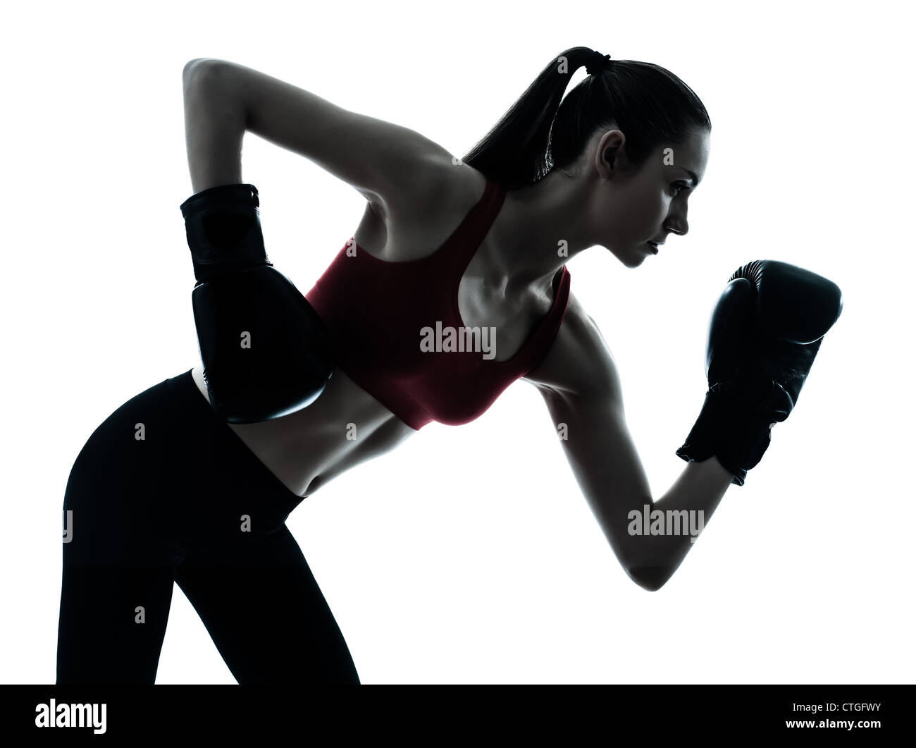 one caucasian woman boxing exercising in silhouette studio isolated on ...